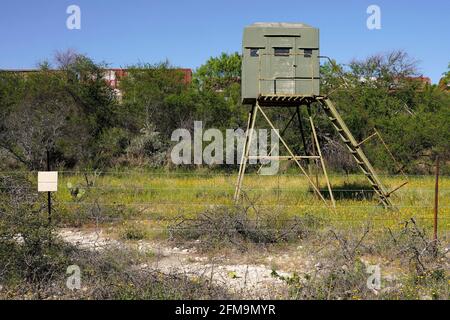 A border patrol watch tower faces the Rio Grande in Del Rio Texas ...