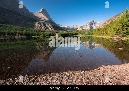 Mountain scenery on the Swiftcurrent Pass Trail in Glacier National ...