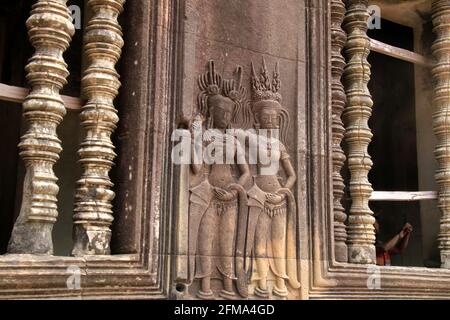 Bas-Reliefs on the window of Angkor Wat Cambodia Stock Photo - Alamy