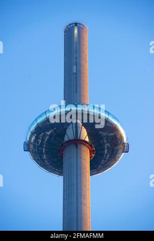 The i360 observation tower against a blue sky and the late afternoon ...