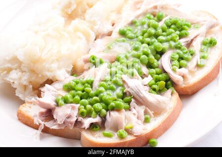 open faced hot chicken sandwich with mased potatoes Stock Photo - Alamy