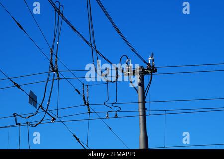 Power feed to an overhead line Stock Photo - Alamy