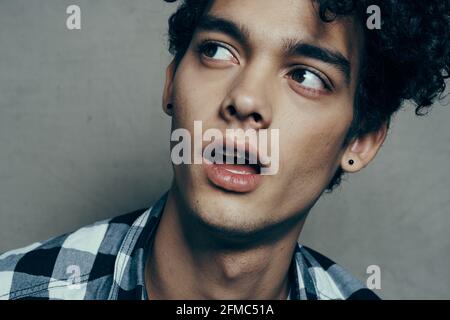 cute guy number shirt fun hair curly hair close up Stock Photo - Alamy