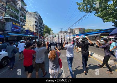 Yangon, Myanmar. 07th May, 2021. Protesters march through the Streets ...