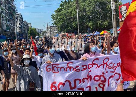 Yangon, Myanmar. 07th May, 2021. Protesters march through the Streets ...