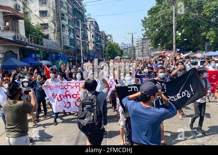 Yangon, Myanmar. 07th May, 2021. Protesters march through the Streets ...