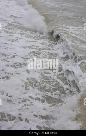 White Cap Wave Hitting the Shoreline Stock Photo - Alamy
