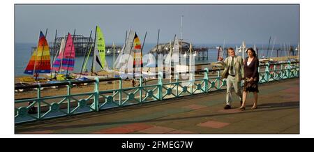 Charles and Sarah Kennedy walk down the beach front in Brighton ahead ...