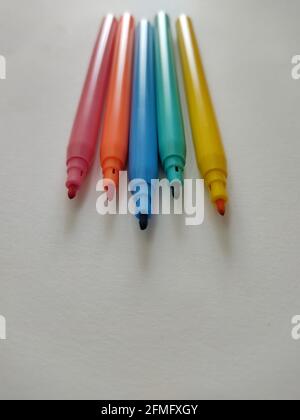 Colorful markers isolated on white background Stock Photo - Alamy