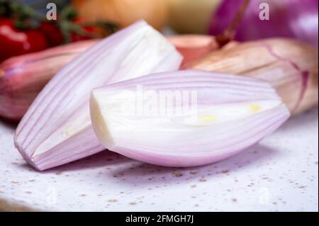 Onion collection, pink French shallot onlons close up Stock Photo - Alamy