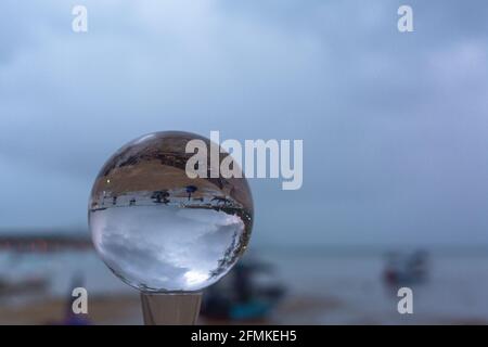 raining on crystal balls beside the beach. Nature image raining ...