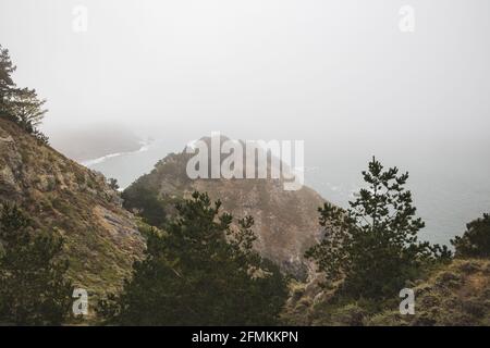 Aerial shot of the cliffs and the ocean captured in Muir Beach ...