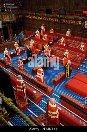 Members of the House of Lords stand during the State Opening of ...