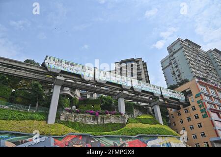 CHONGQING, CHINA - MAY 10, 2021 - Tourists watch or photograph the ...