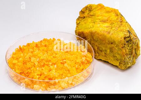 uranium mineral isolated on black background. Highly radioactive and ...