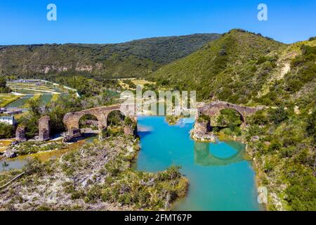 Medieval Roncal bridge of Yesa, which crosses the Aragon river Spain ...