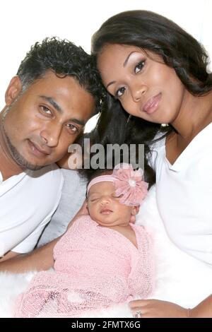 Navid Ali, Naliyah, Mishael Morgan posing for a portrait for Mishael ...
