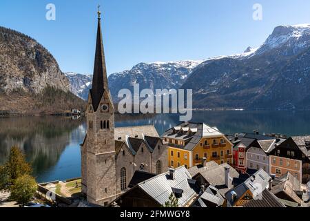 Hallstatt, Austria - March 31, 2021 View of Hallstatt with snow-capped ...