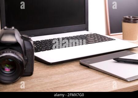 Typical hipster photographer workplace. Fashionable photo camera ...