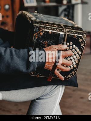 closeup man's hand playing his old classical guitar Stock Photo - Alamy