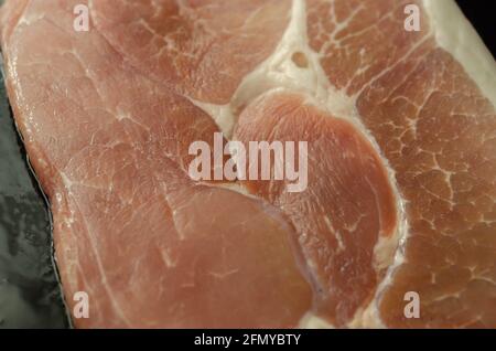 Smoked gammon steak formed from selected cuts of cured pork leg ...