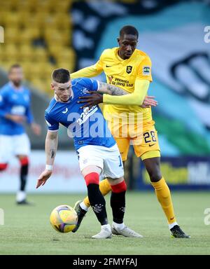 Livingston's Djibri Diani (right) and Rangers' Ryan Kent (left) battle ...