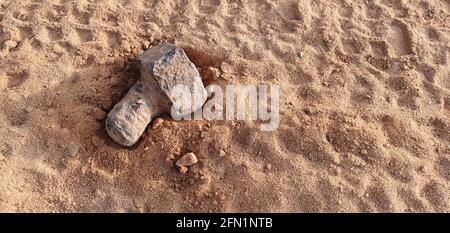 a rusty bolt lost in the sand Stock Photo - Alamy