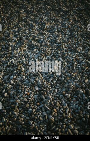 Vertical closeup shot of the stack of pebbles for backgrounds - balance ...
