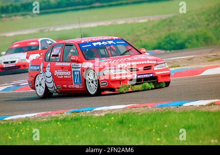 Matt Neal collecting grass in his front spoiler at Thruxton Circuit ...