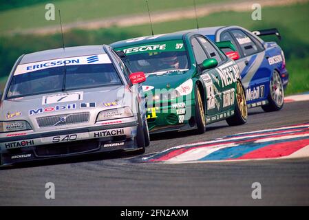 Volvo S40 of Rickard Rydell and Vincent Radermecker nose to tail racing ...