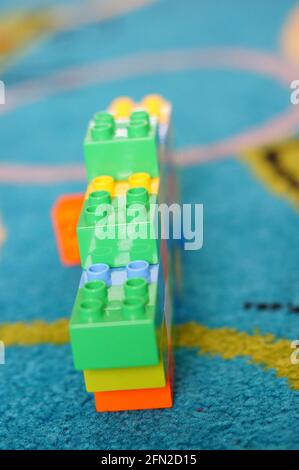 Lego Duplo blocks on a floor Stock Photo - Alamy
