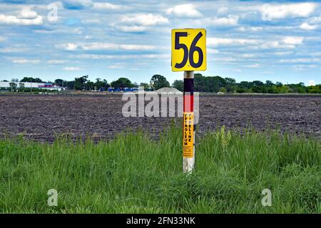 Petroleum pipeline crossing warning signs indicating where underground ...