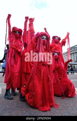 Activist performance art troupe the Red Rebel Brigade wearing bright ...