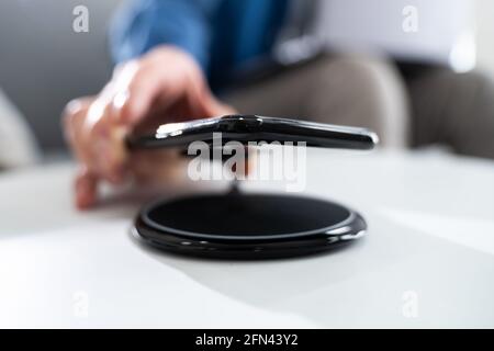 Wireless Inductive Phone Charger. Smartphone Battery Charge Stock Photo ...