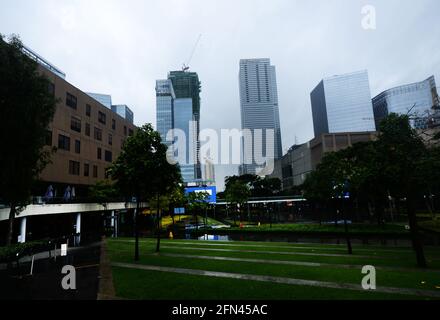 BGC park on High Street with modern buildings around it. Bonifacio ...