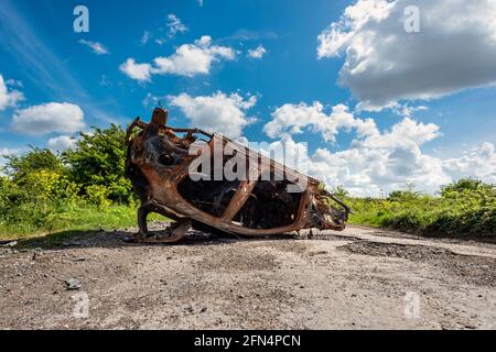 Cooling, May 12th 2021: An abandoned, burnt-out car at Cliffe Pools ...