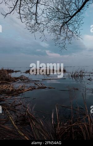 Sunset on Lake Nero during a flood Stock Photo - Alamy