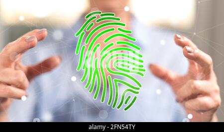 Fingerprint security system concept between hands of a woman in ...