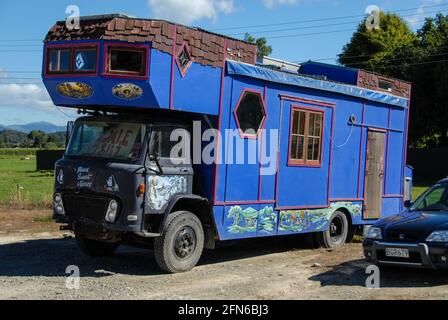 Self-made truck camper on public parking area Stock Photo - Alamy