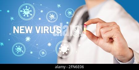 Doctor giving pill, virus concept Stock Photo - Alamy