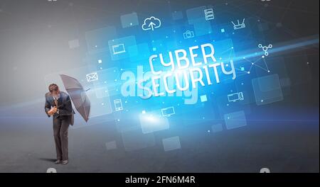 defending with umbrella from cyber attack Stock Photo - Alamy