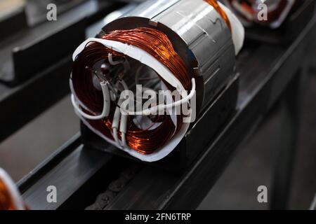 The stator of an industrial electric motor at the assembly stage. Thick ...