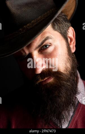 gold rush. wild west rodeo. Handsome man in hat. western cowboy ...