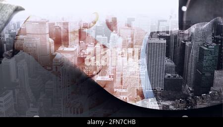 Grey technology background over mid section of two businessmen shaking ...