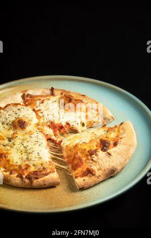 Pizza mozzarella with melted slice Stock Photo - Alamy
