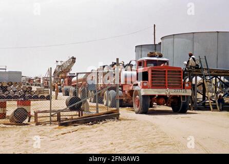 Drilling for oil in the Saudi desert near Abqaiq, by the Arabian ...