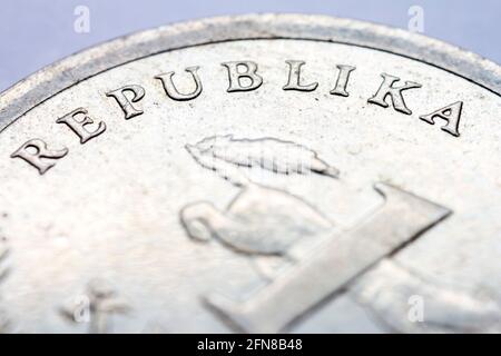 A fragment of croatian metal coin macro photo of one kuna. Selective ...