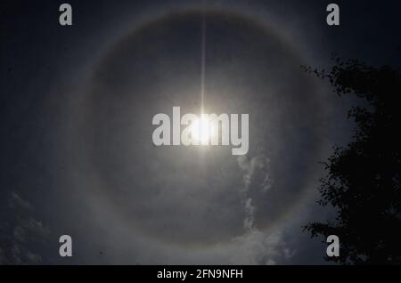 The halo phenomenon is seen around the sun in Srinagar. Sun halos are ...