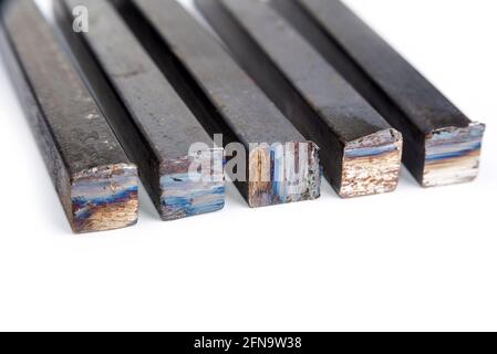 Square iron rod on a white background Stock Photo - Alamy