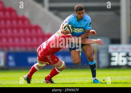 Ben Thomas of Cardiff rugby is tackled by Sam Crean of Ulster (1). EPCR ...